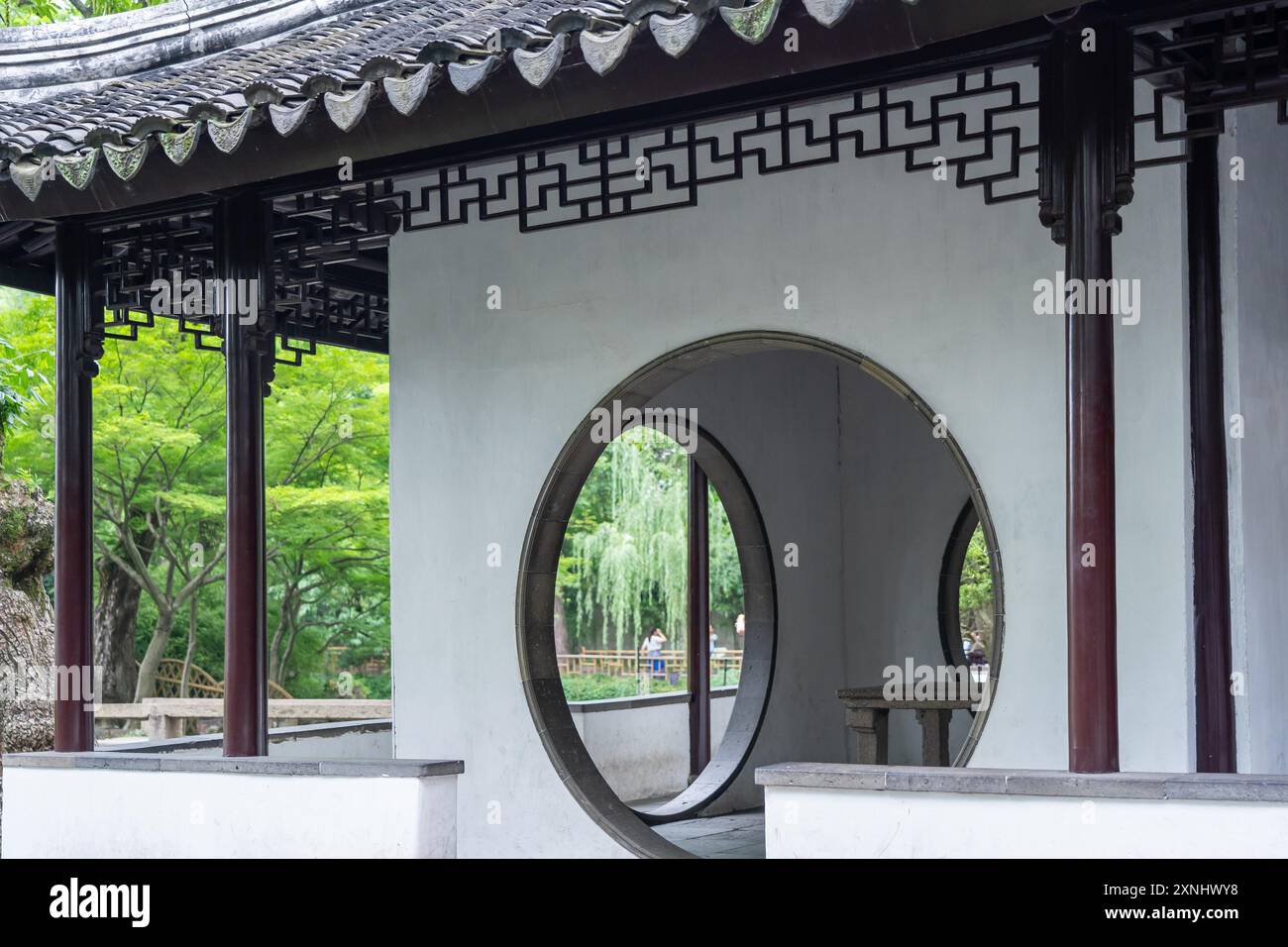 Suzhou, China - June 11, 2024 : A view through a circular window of a ...