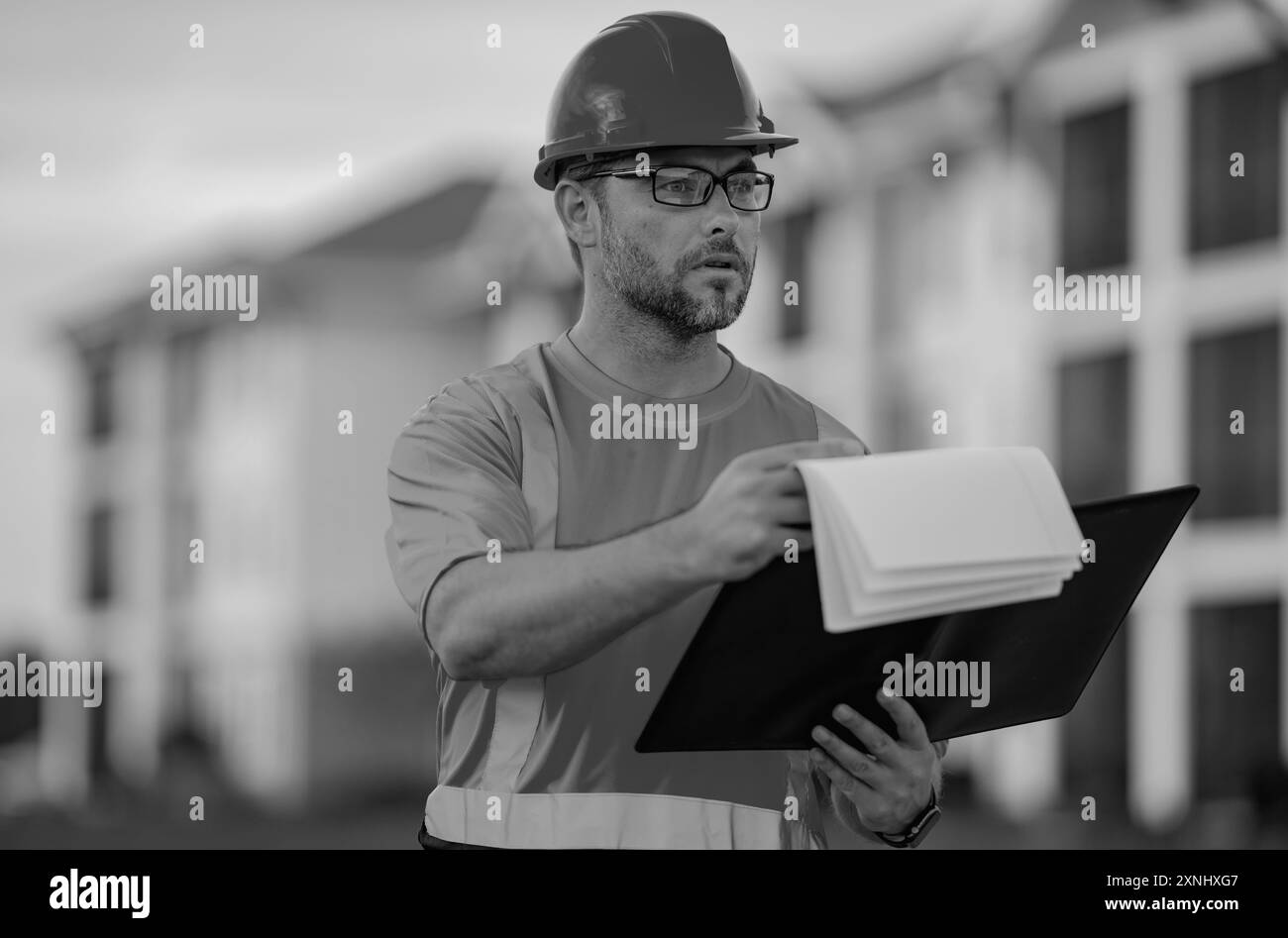 Hard hat clipboard Black and White Stock Photos & Images - Alamy