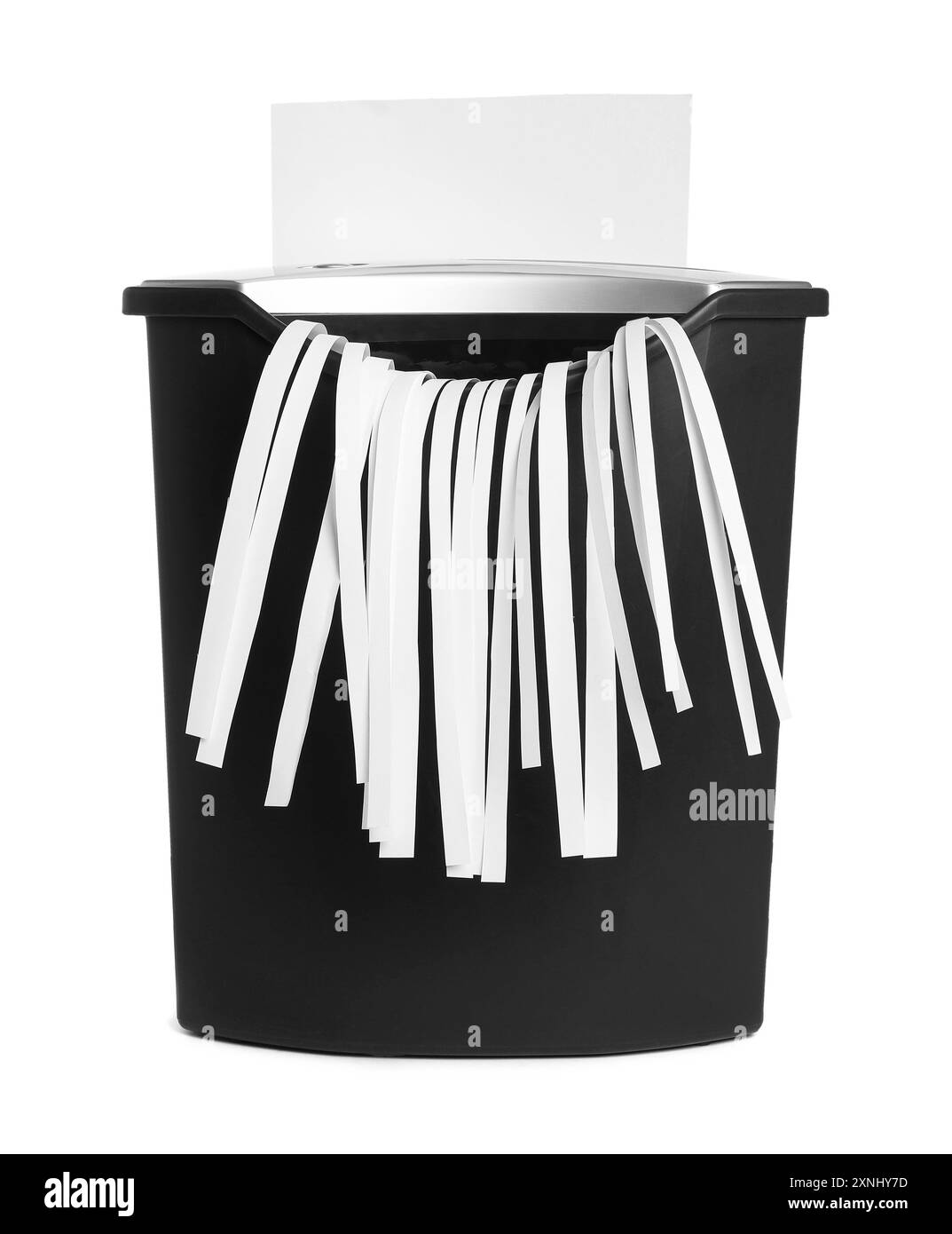 Destroying sheet of paper with shredder on white background Stock Photo ...