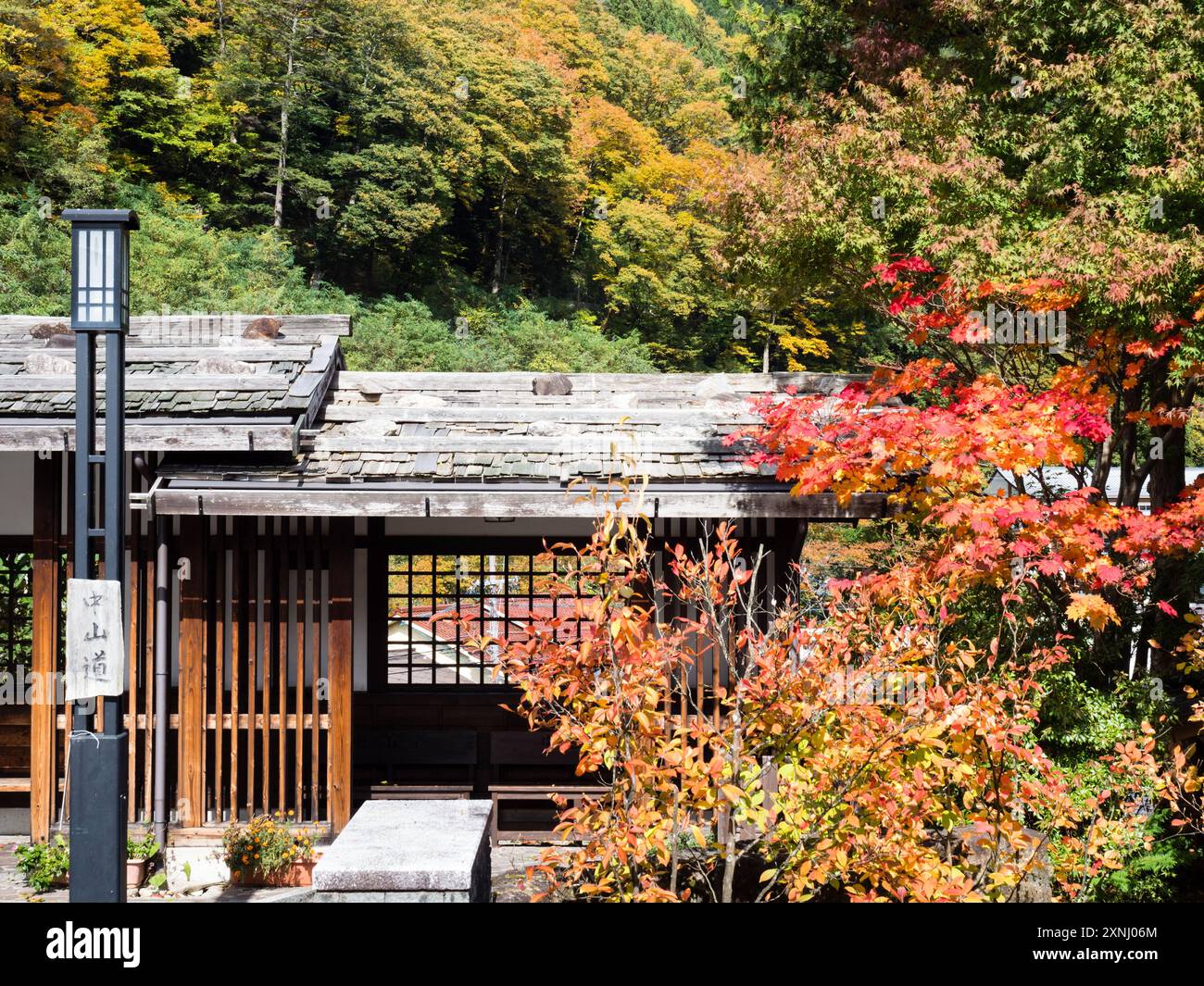 Kiso, Nagano prefecture, Japan - October 23, 2017: Fall foliage in historic old town of Kiso ...