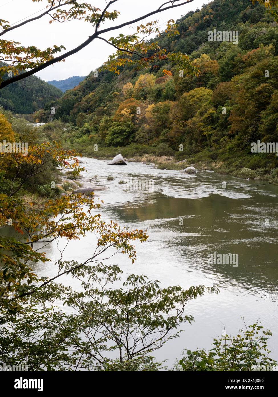Scenic Kiso river valley in early fall with leaves starting to change ...