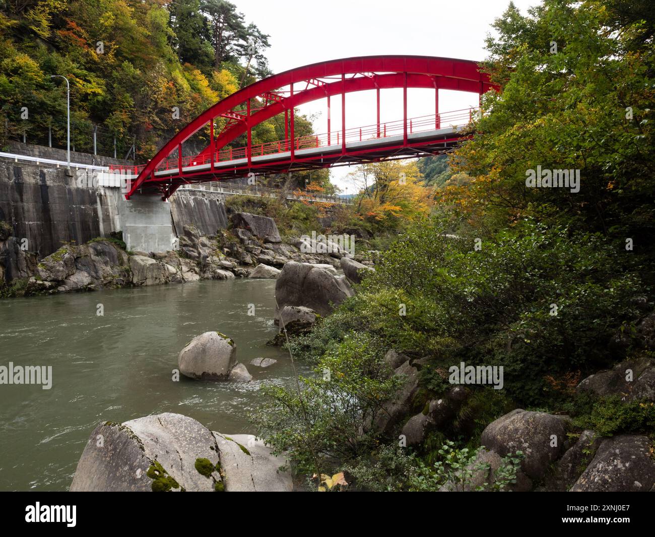 Red bridge over the Kiso river at Kiso-no-Kakehashi, a scenic spot in ...