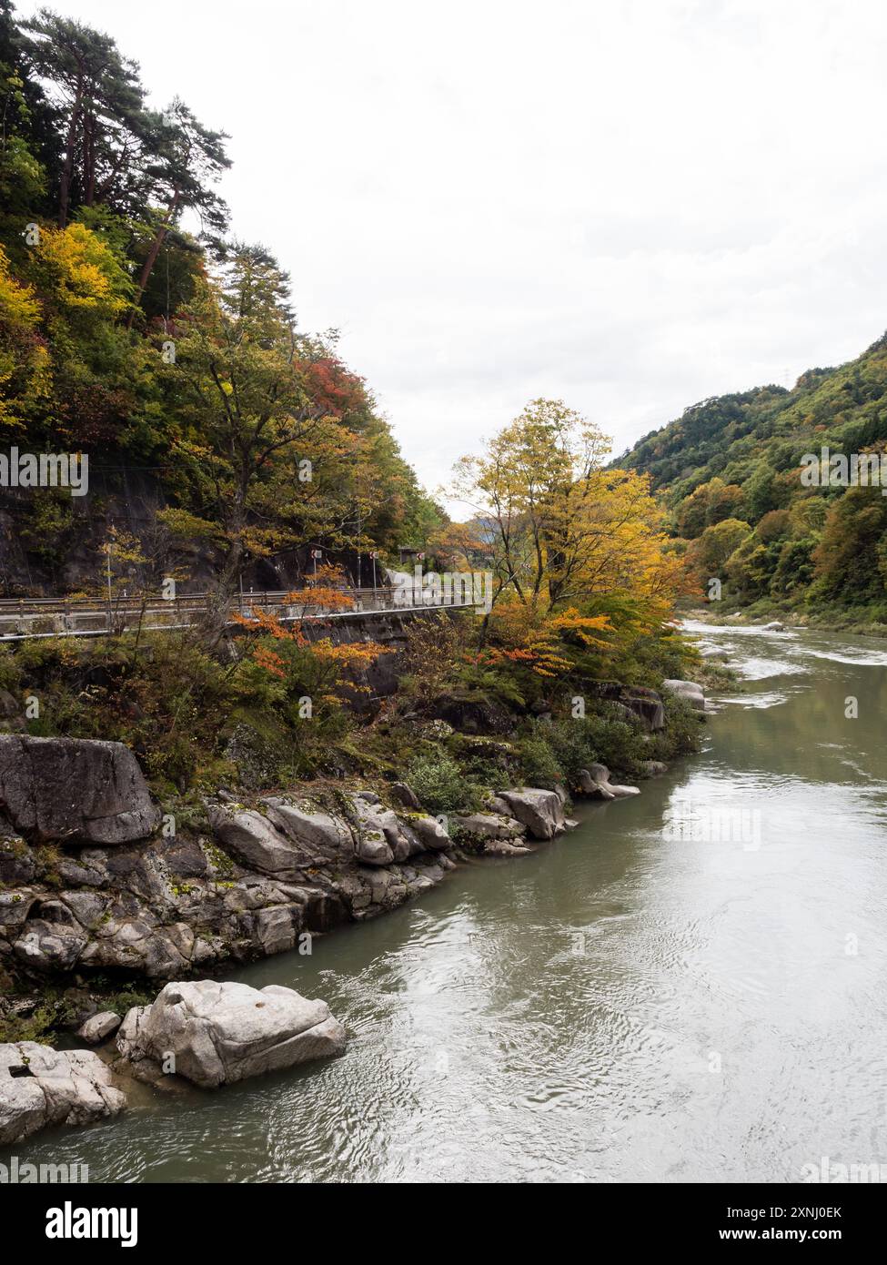 Scenic Kiso river valley in early fall with leaves starting to change ...