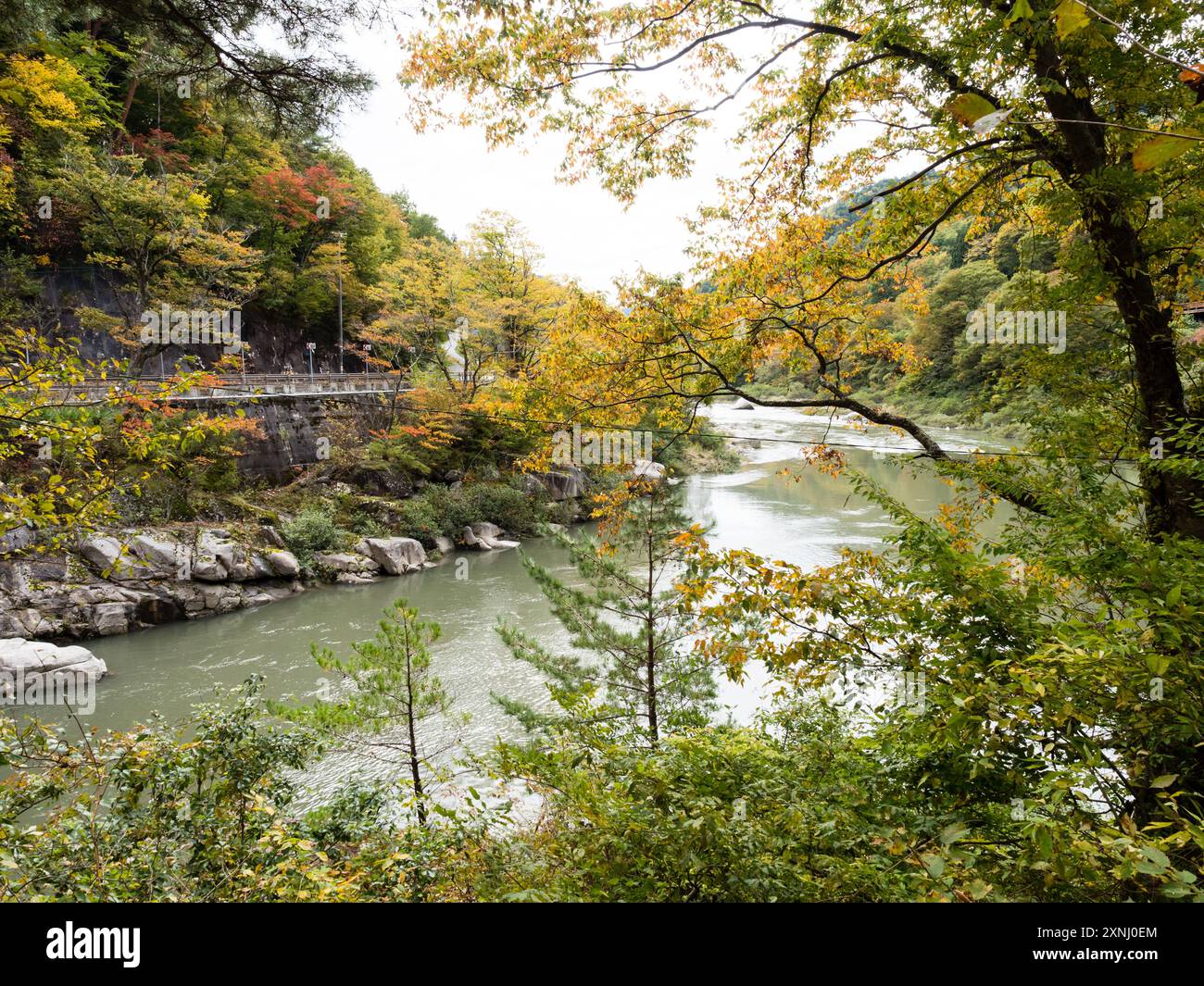 Scenic Kiso river valley in early fall with leaves starting to change ...