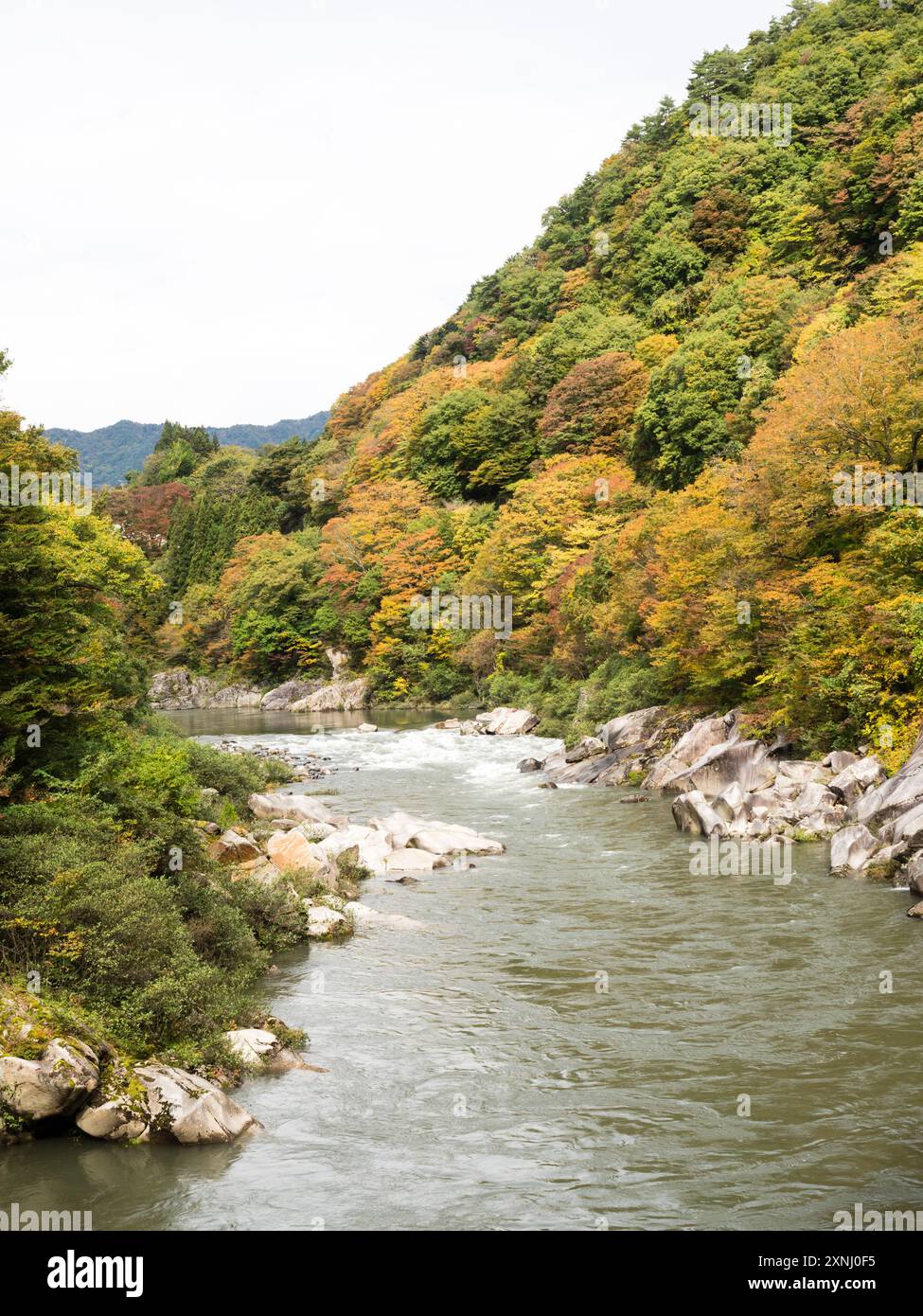 Scenic Kiso river valley in early fall with leaves starting to change ...