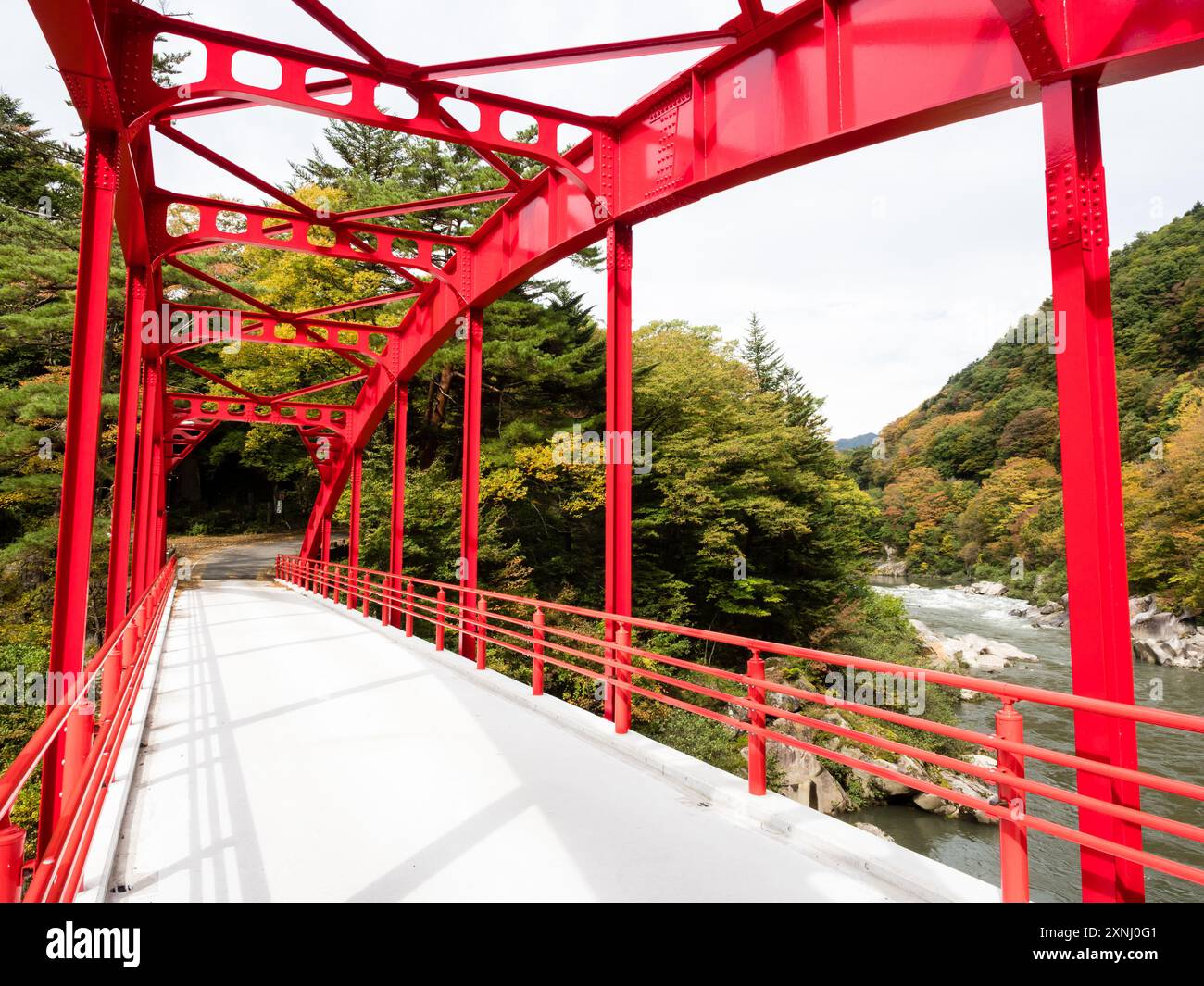 Red bridge over the Kiso river at Kiso-no-Kakehashi, a scenic spot in ...