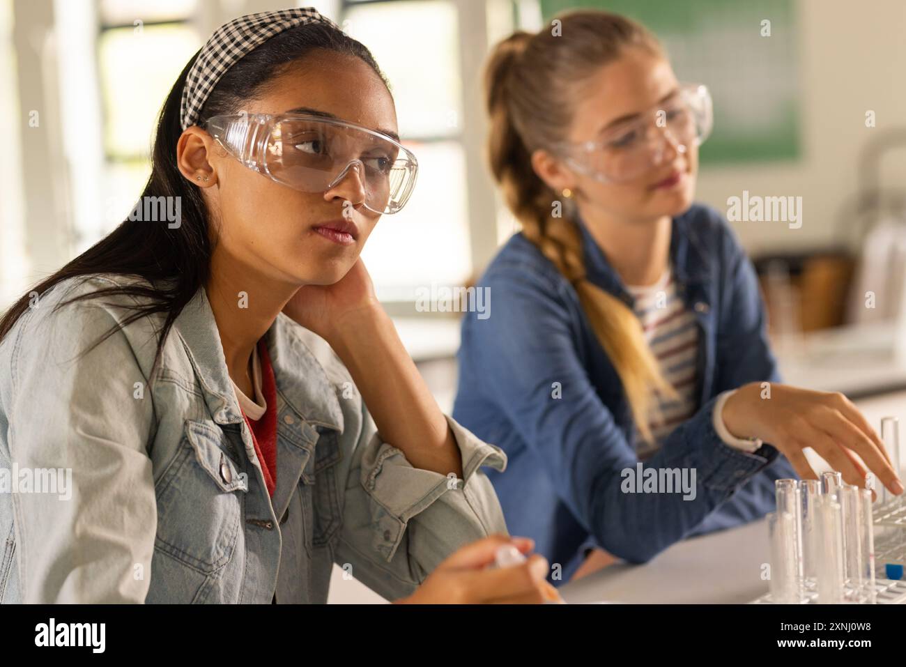 School science experiment glasses coats hi-res stock photography and ...