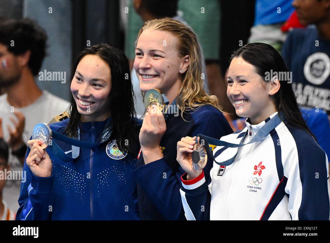 Torri Huske ( USA ) Silver medal, Sarah Sjoestroem ( SWE ) Gold medal ...