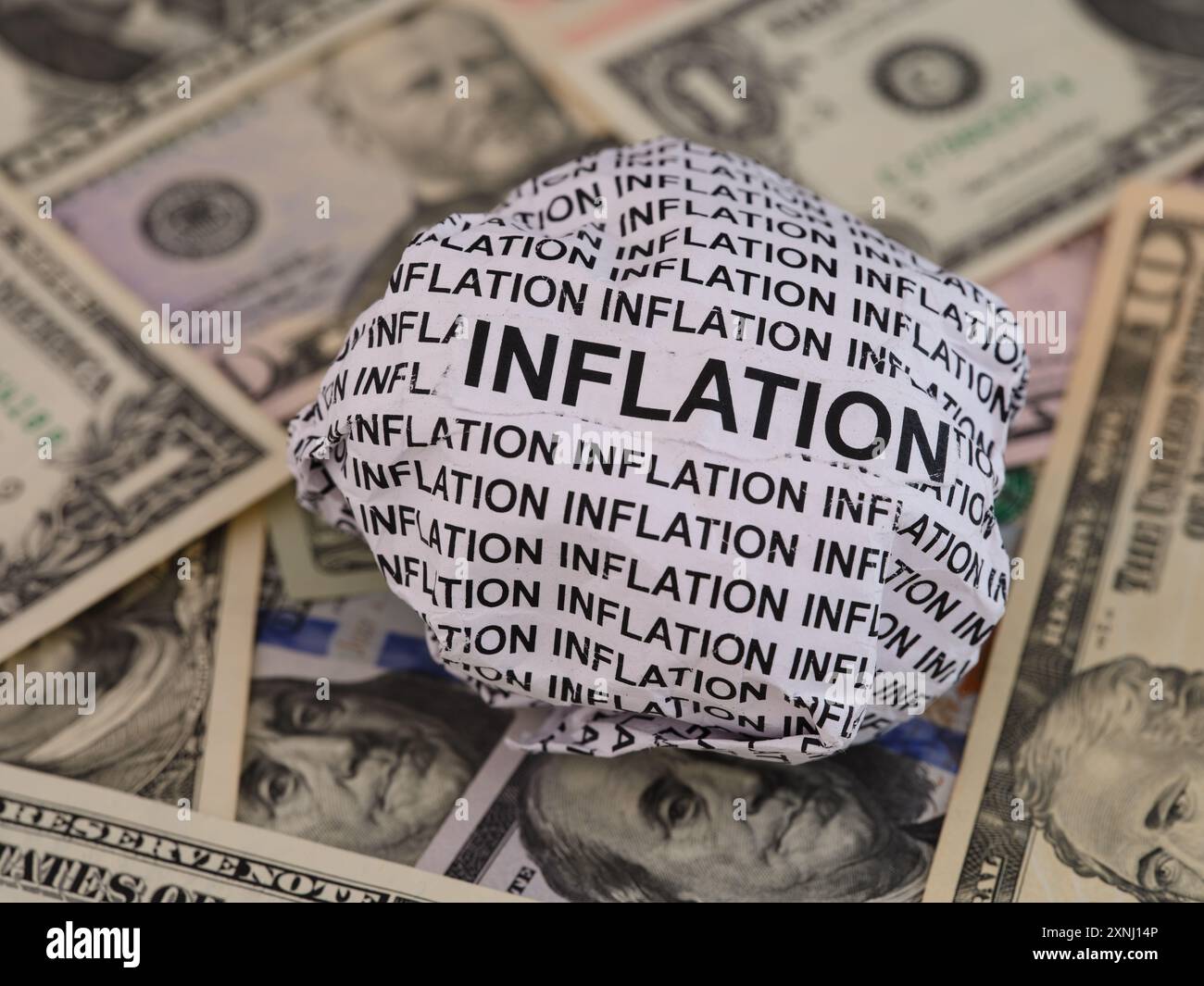 Crumpled paper ball with words Inflation lying on a United States ...
