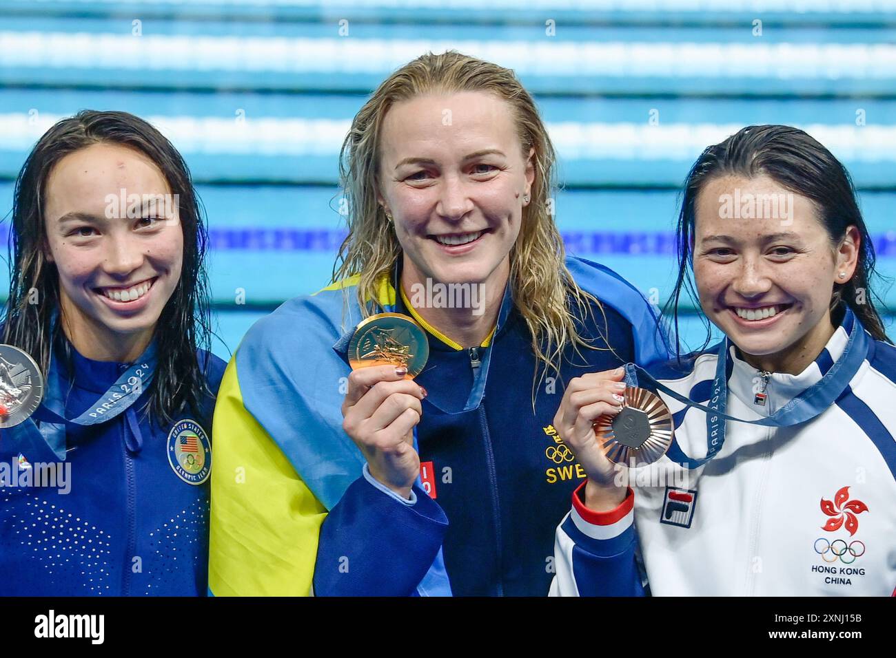Torri Huske ( USA ) Silver medal, Sarah Sjoestroem ( SWE ) Gold medal ...