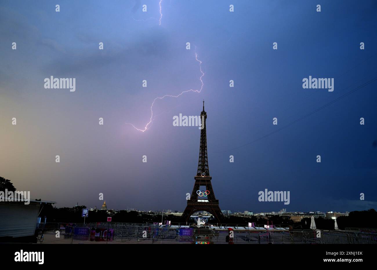 Lightning strikes near the Eiffel Tower, ahead of the start of Men's ...