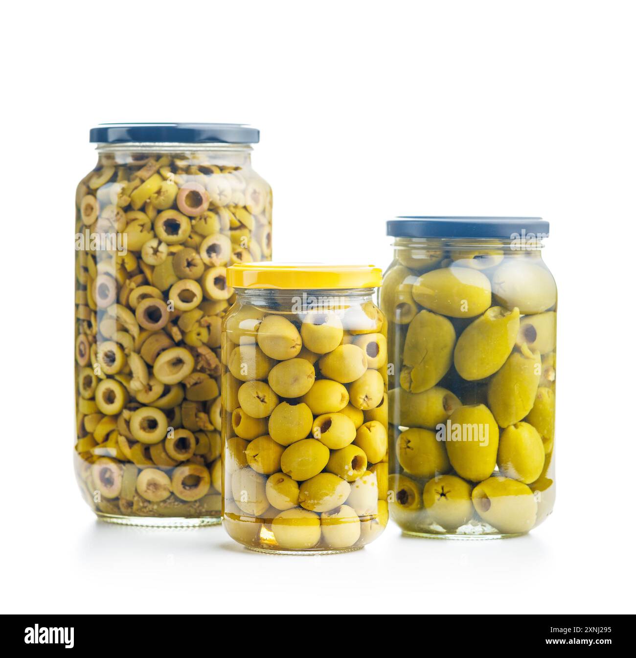 Pickled green olives in brine in jar isolated on a white background ...