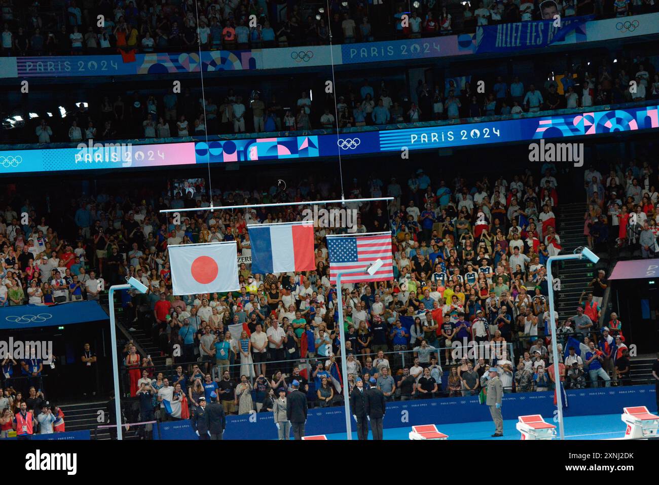 The flags podium during Swimming - Men's 400m Individual Medley Final ...