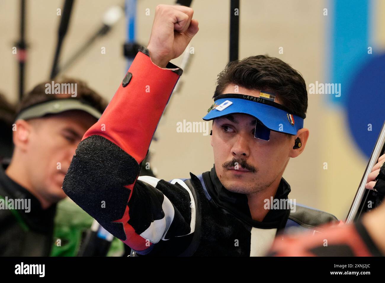 France's Lucas Bernard Denis Kryzs gestures as he is introduced before ...