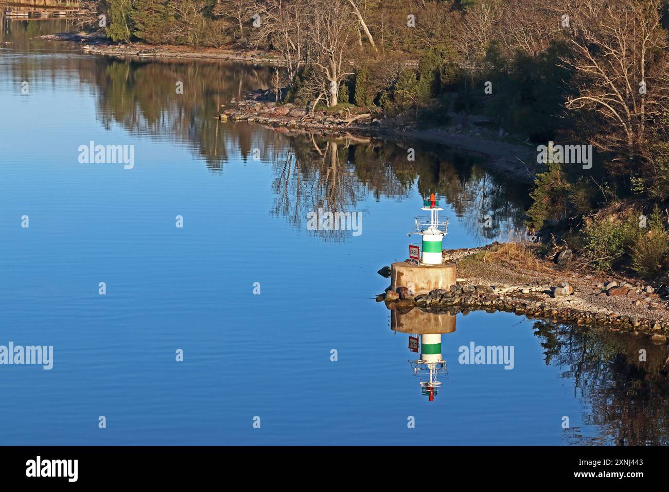 Small beacon warning of underwater cable, Stcokholm Archipelago Stock ...