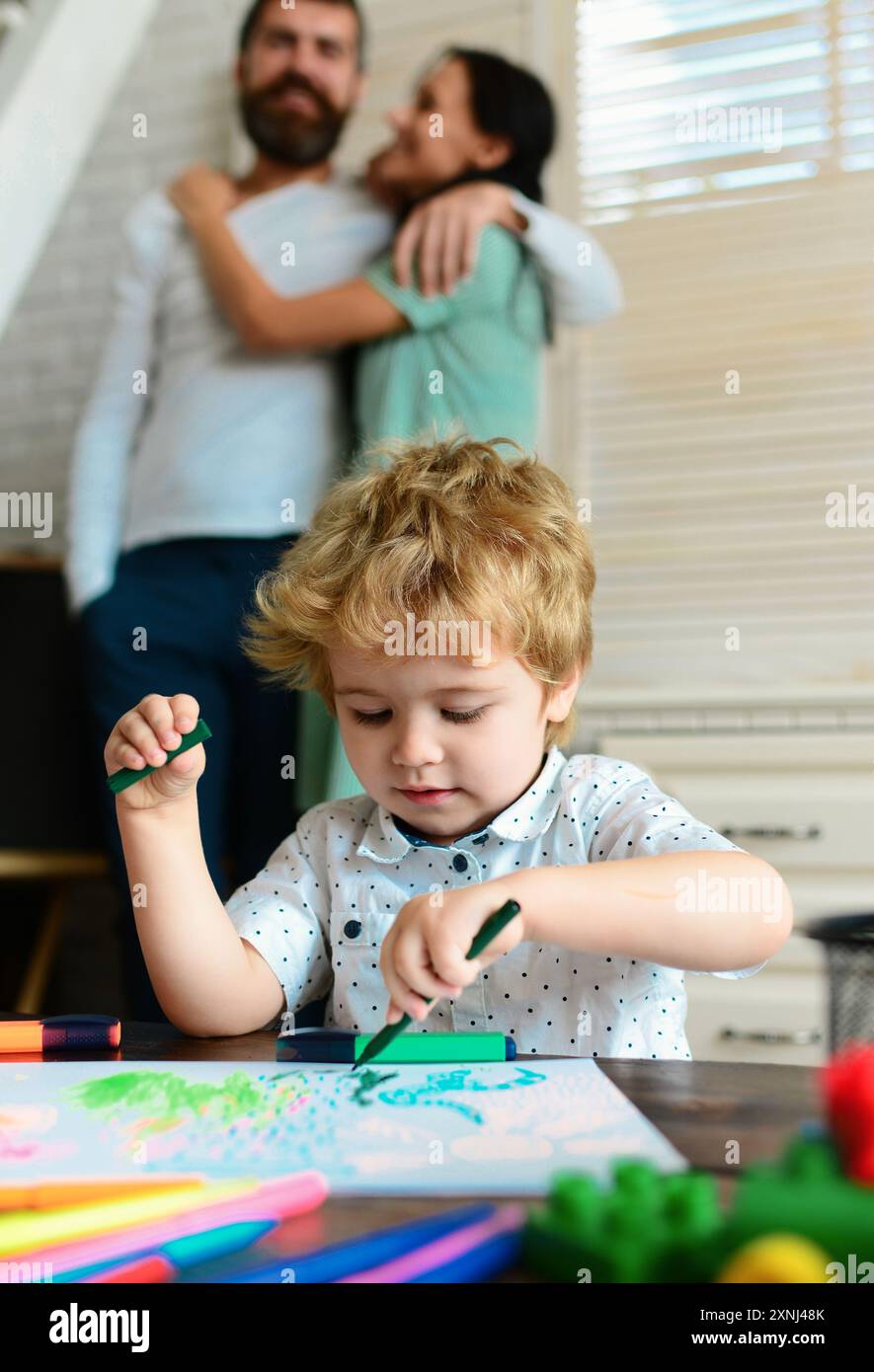Happy family having fun, parents and little child playing together ...