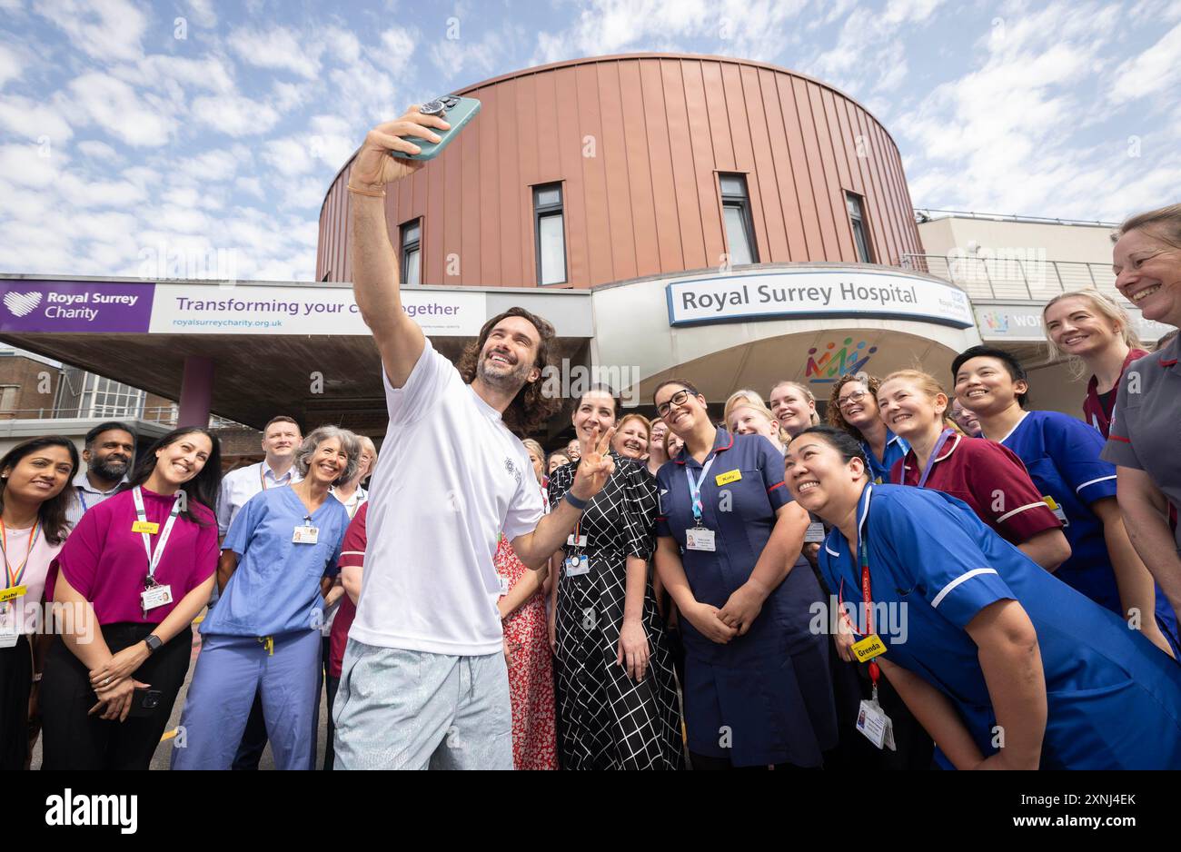 EDITORIAL USE ONLY Joe Wicks leads an exercise class at Royal Surrey ...