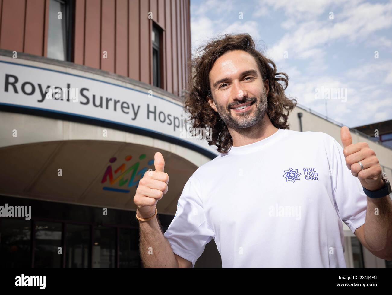 EDITORIAL USE ONLY Joe Wicks leads an exercise class at Royal Surrey ...