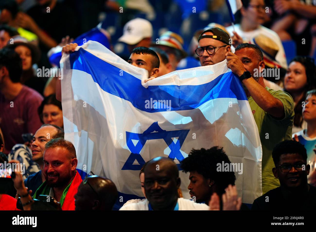 Spectators with an Israel flag at the Champ-de-Mars Arena on the sixth ...