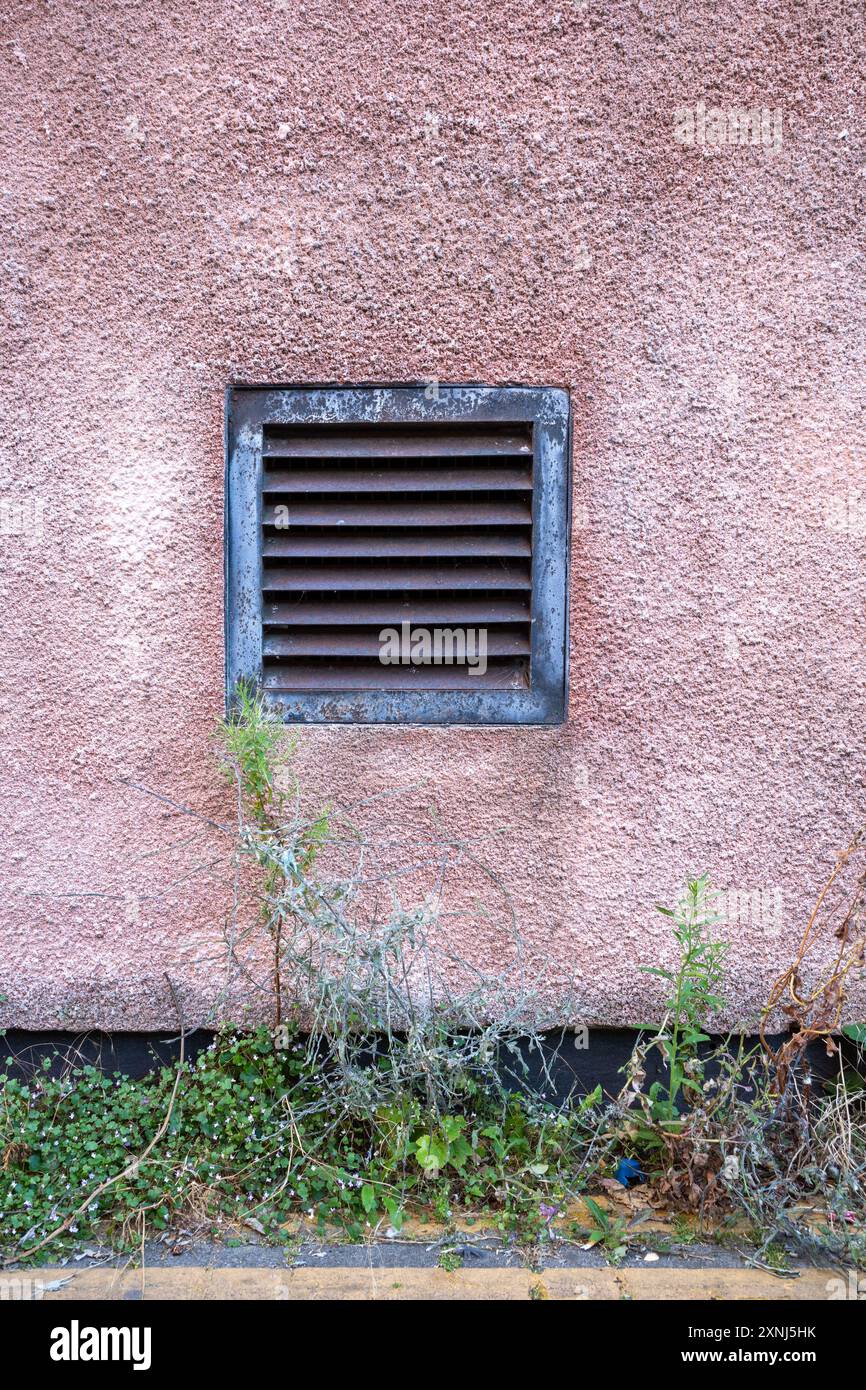 Air con vent on a pink wall Stock Photo - Alamy