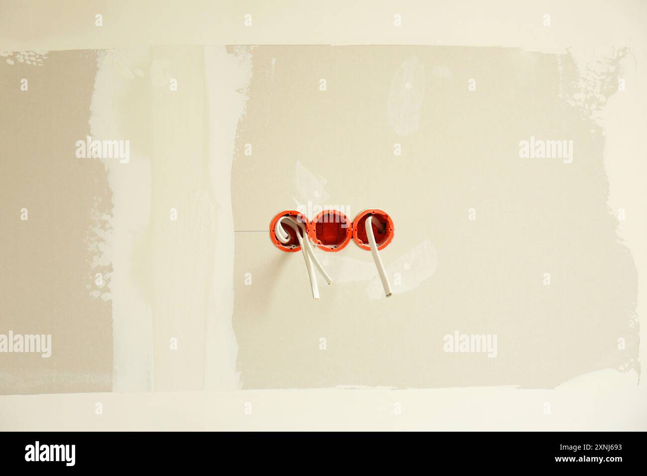 Holes for socket in wall with cables indoors. Installation of ...