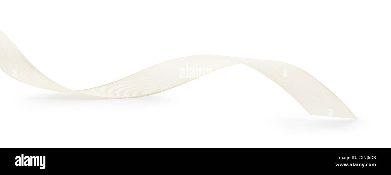 One beautiful beige ribbon isolated on white Stock Photo - Alamy