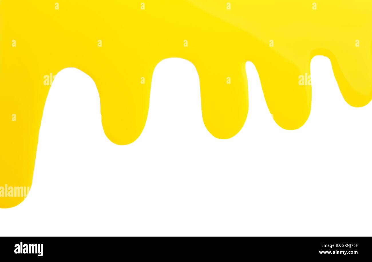 Spilled yellow printer ink isolated on white, top view Stock Photo - Alamy