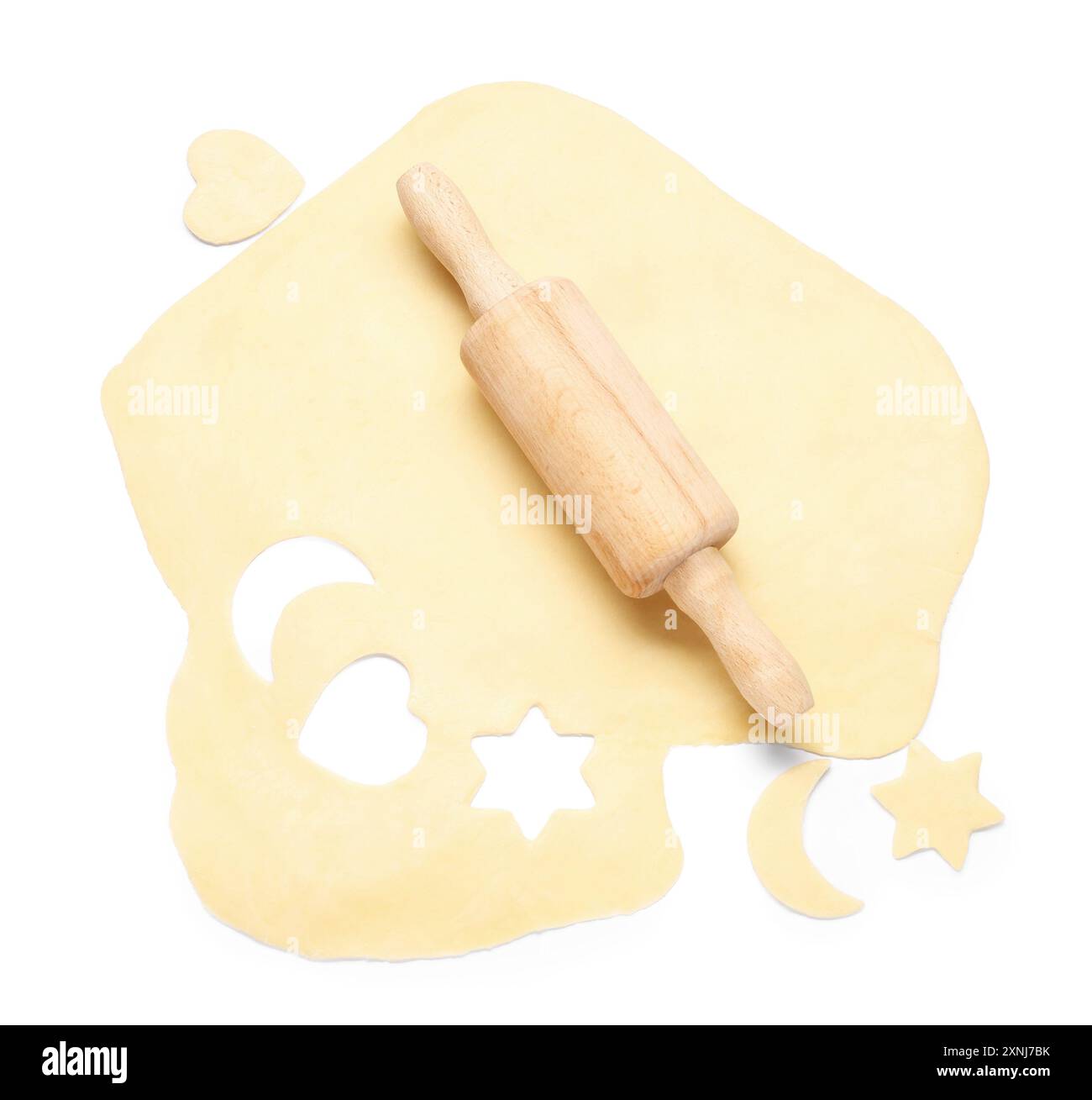 Raw dough and wooden rolling pin isolated on white, top view Stock ...