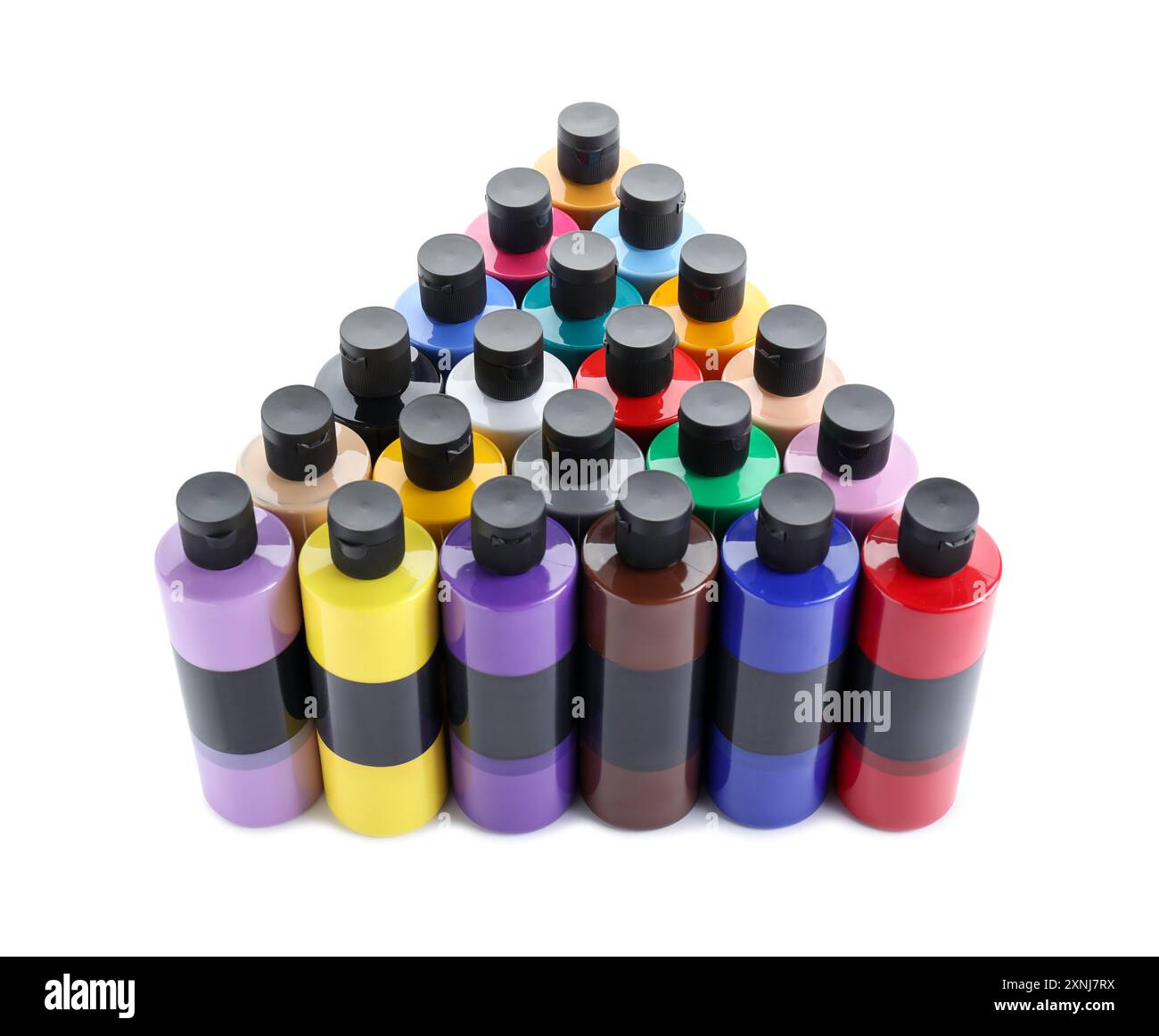 Acrylic paints of different colors in bottles isolated on white, above ...