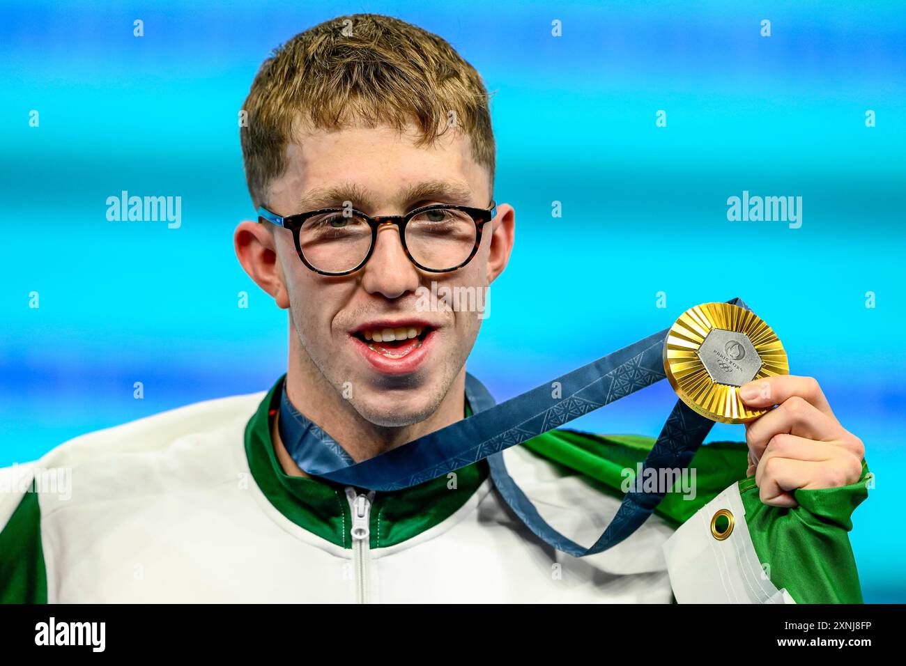 Daniel Wiffen of Ireland shows the medal of the swimming 800m Freestyle ...