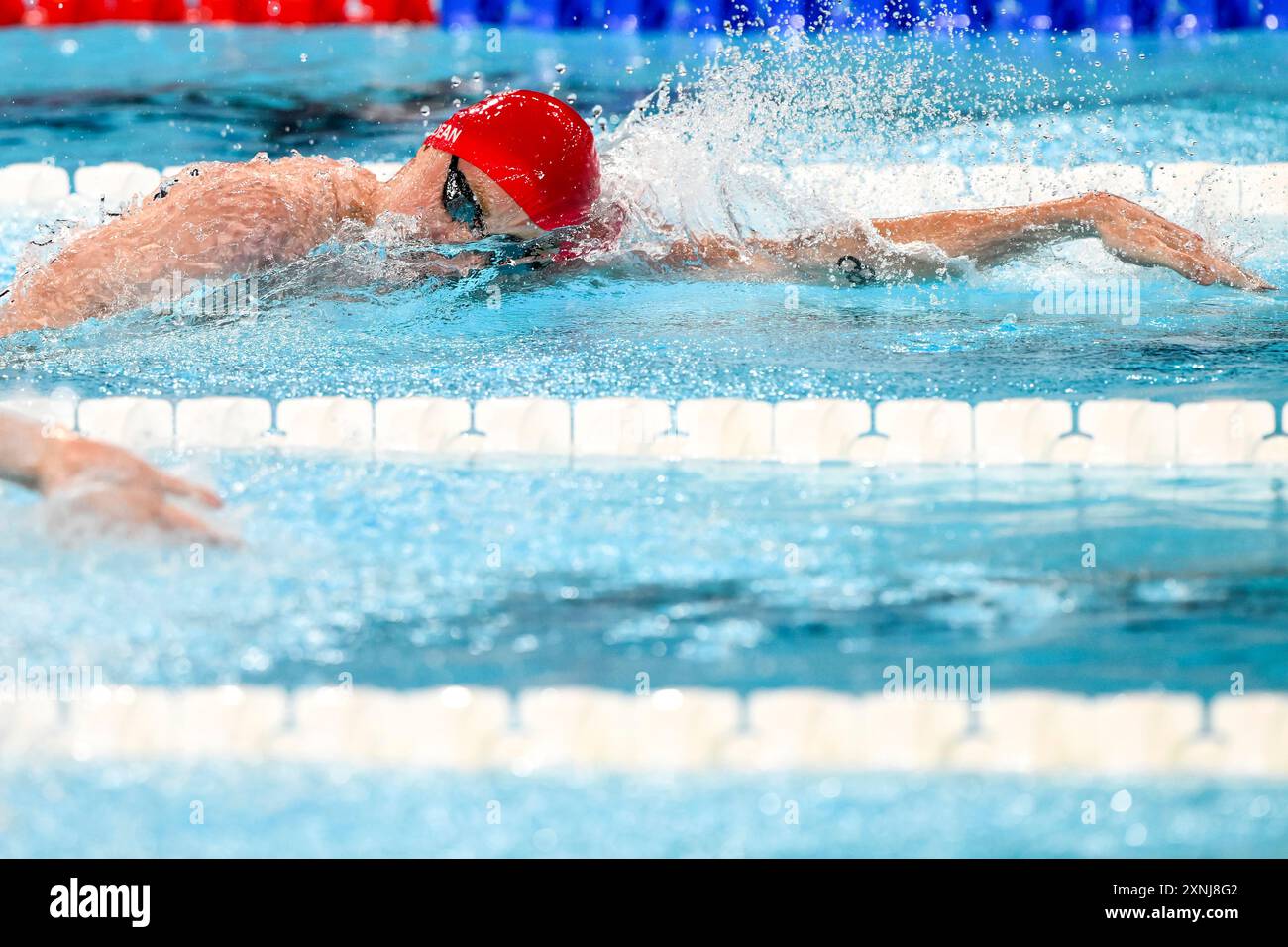 Tom Dean of Great Britain competes in the swimming 4x200m Freestyle men ...