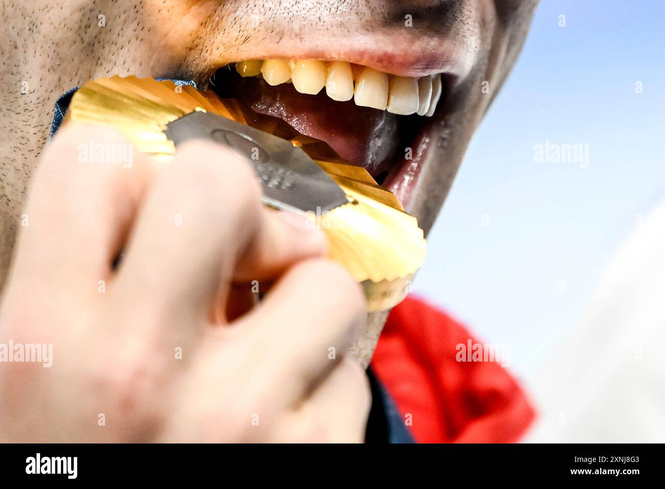 James Guy of Great Britain bites the medal of the swimming 4x200m ...