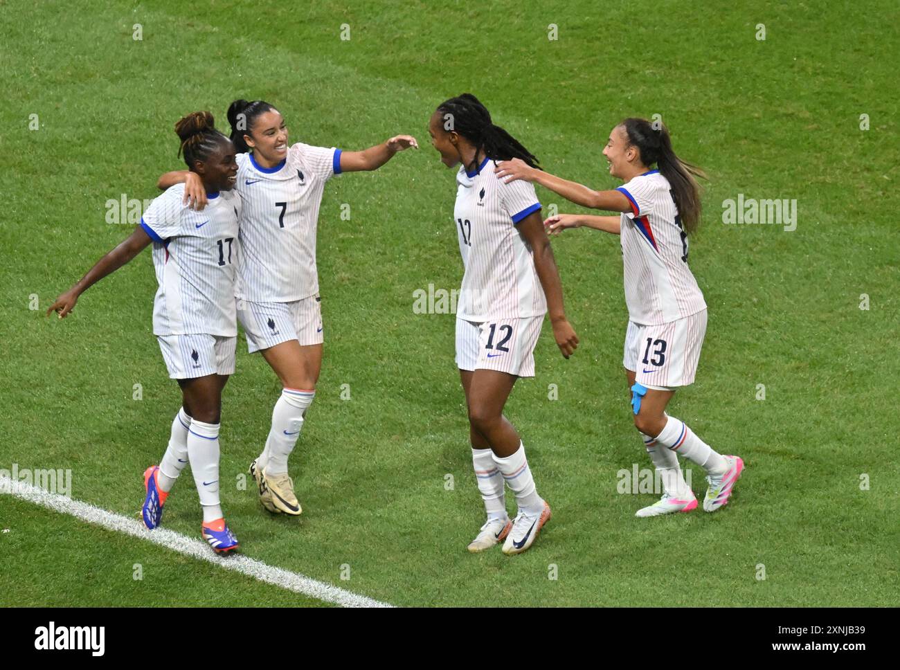 Marie-Antoinette Katoto (France) celebrates a goal with teammates ...