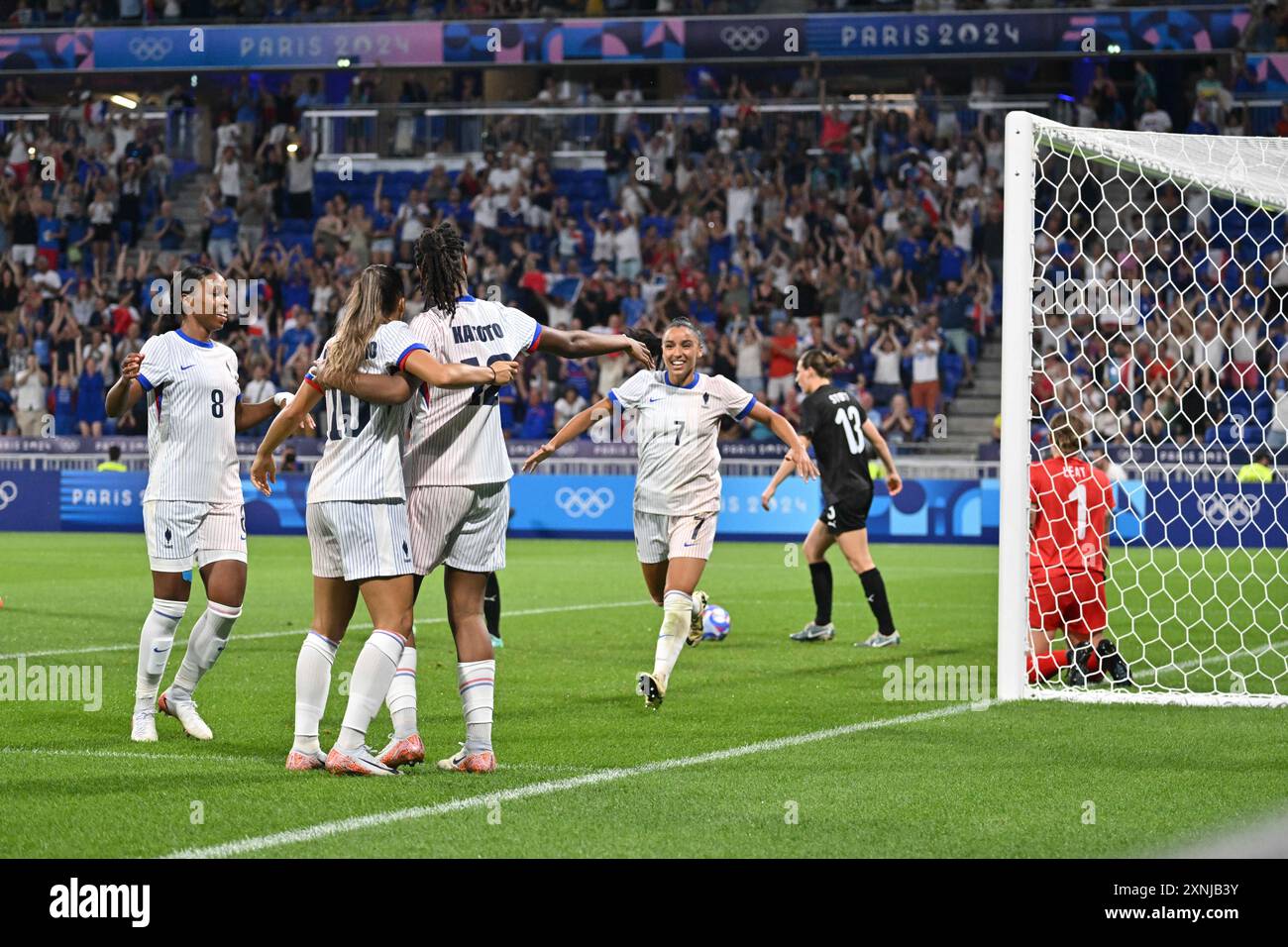 Marie-Antoinette Katoto (France) celebrates a goal with teammates ...