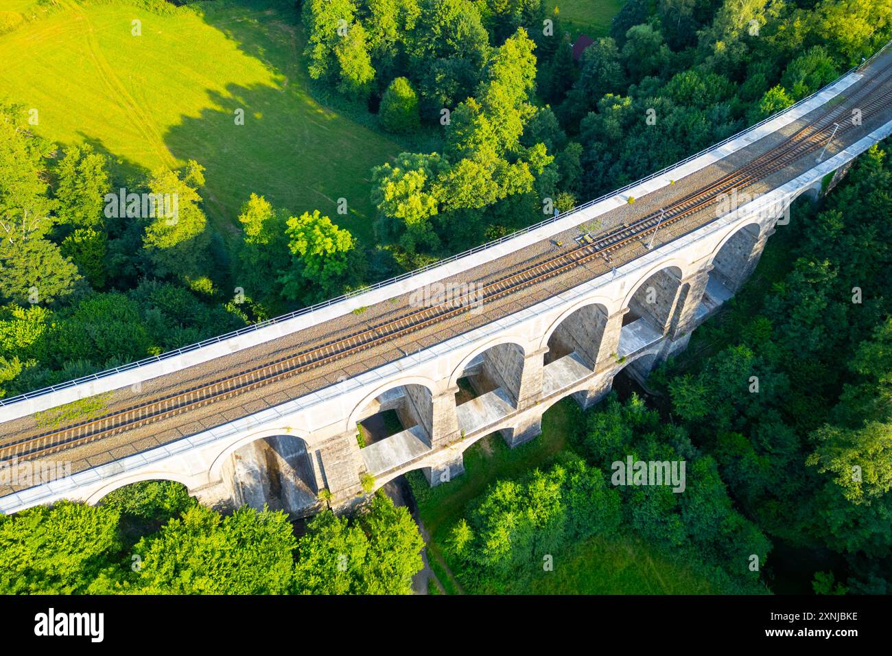 An aerial view showcases the Sychrov Railway Bridge in Czechia ...