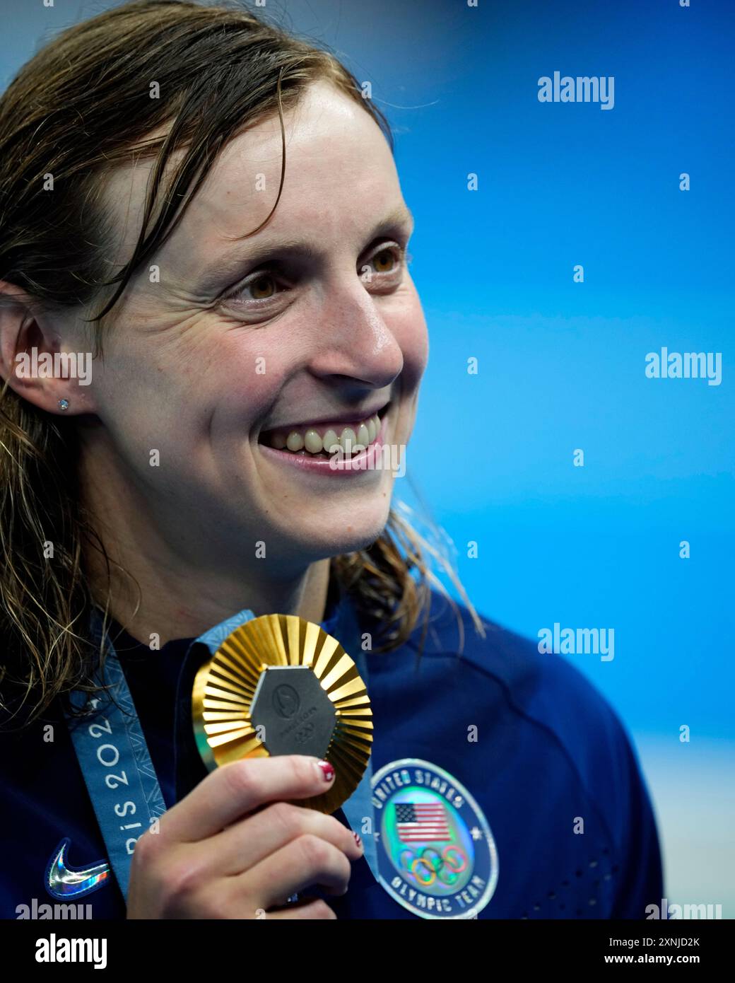 Katie Ledecky, of the United States, poses with her gold medal ...