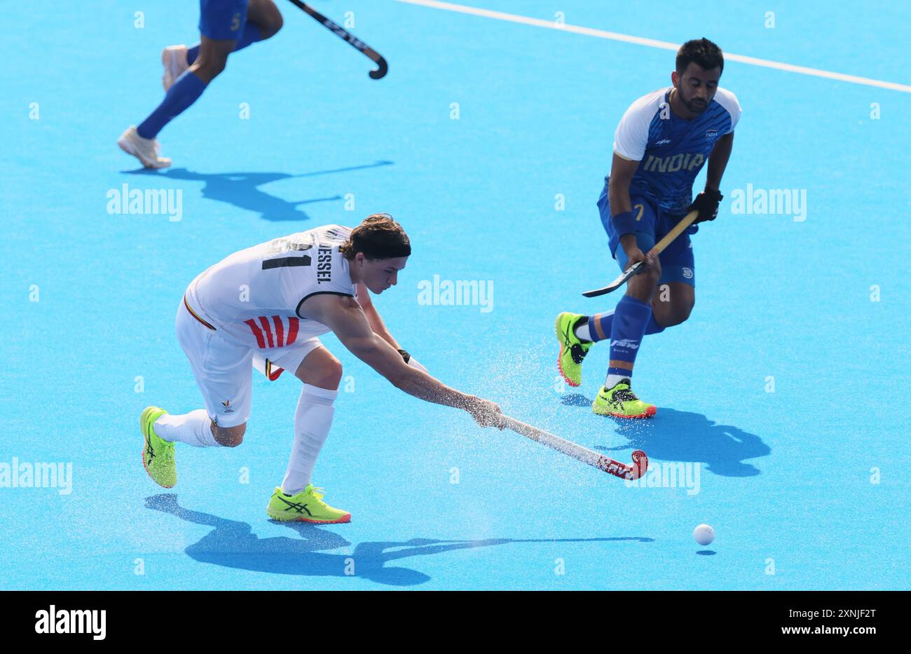 Belgium's Arno Van Dessel fights for the ball during a hockey game ...