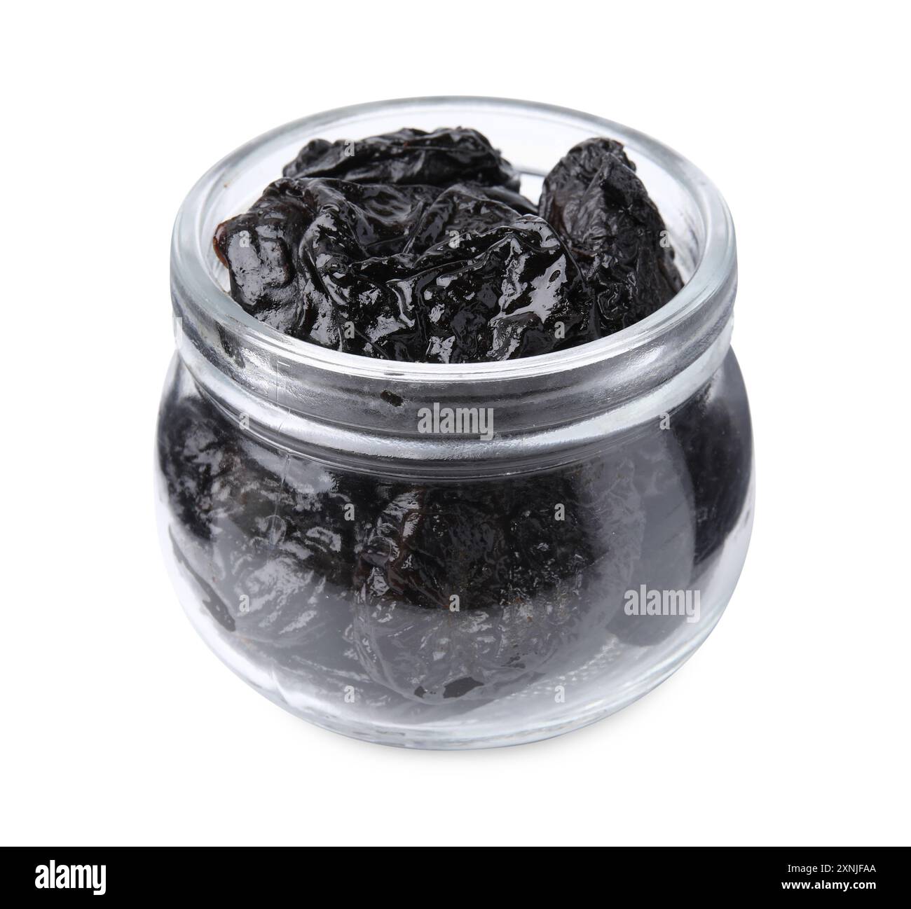 Tasty dried plums (prunes) in glass jar on white background Stock Photo ...