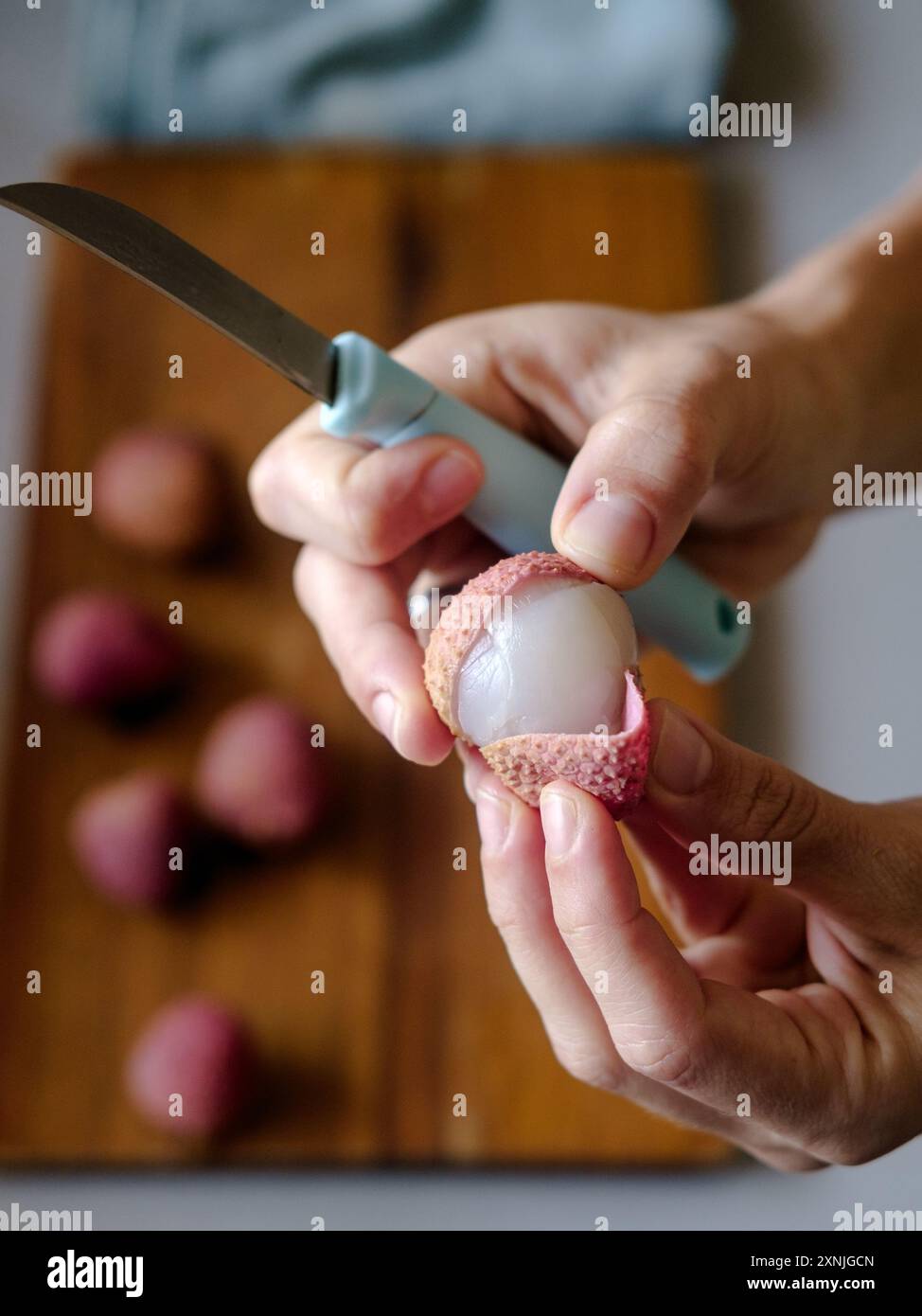 Lychee on a cutting board hi-res stock photography and images - Alamy