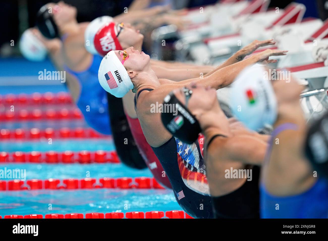 Regan Smith, of United States, competes in her heat of the women's 200 ...