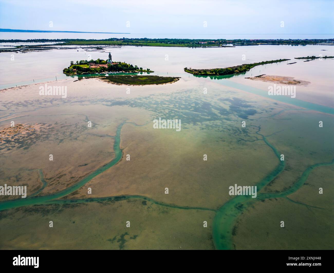 The magic of the Grado lagoon. Among the islands the ancient landing ...