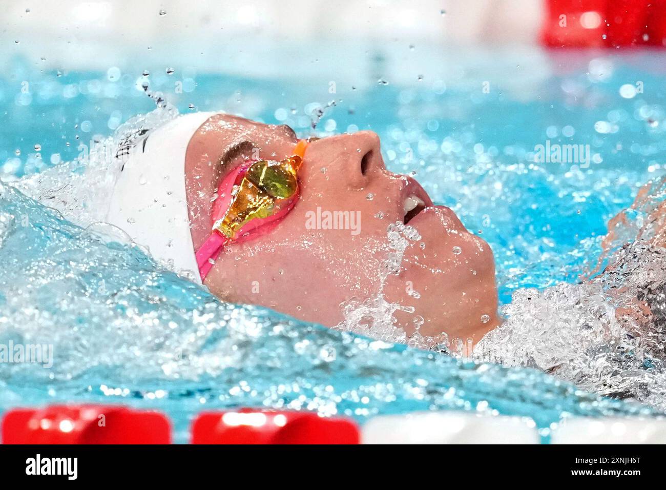 Regan Smith, of United States, competes in her heat of the women's 200 ...