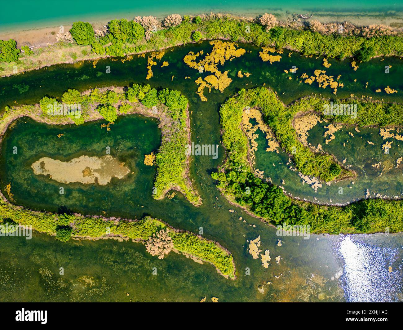 The magic of the Grado lagoon. Among the islands the ancient landing ...