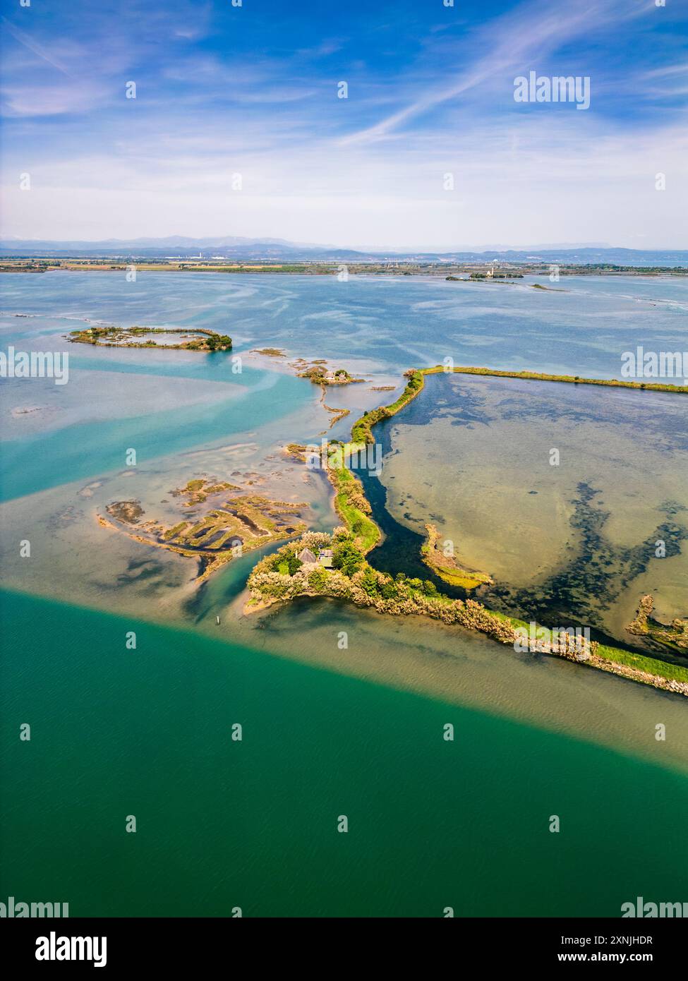 The magic of the Grado lagoon. Among the islands the ancient landing ...