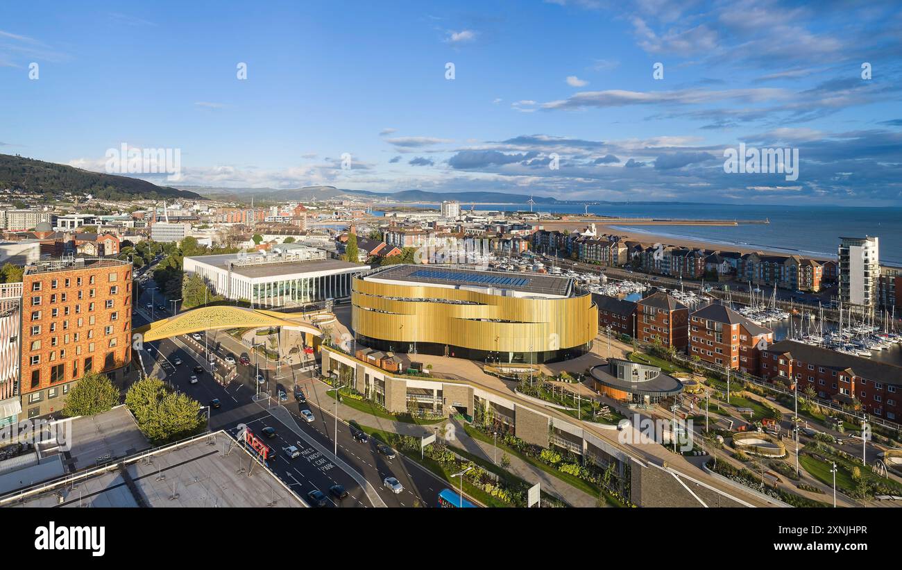 Sunlit aerial view of marina, bridge and arena. Swansea Arena and Copr ...