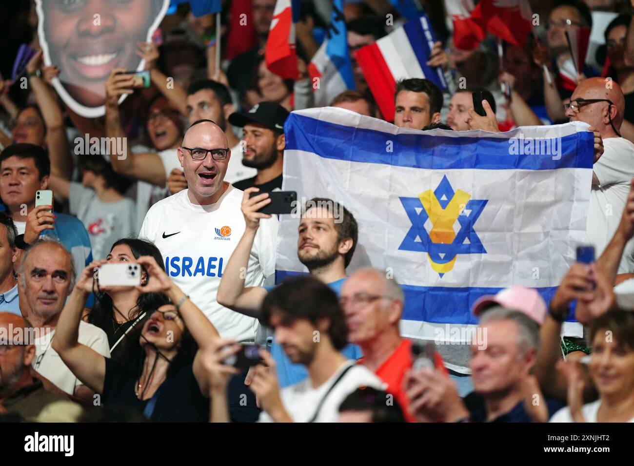 Spectators with an Israel flag at the Champ-de-Mars Arena on the sixth ...
