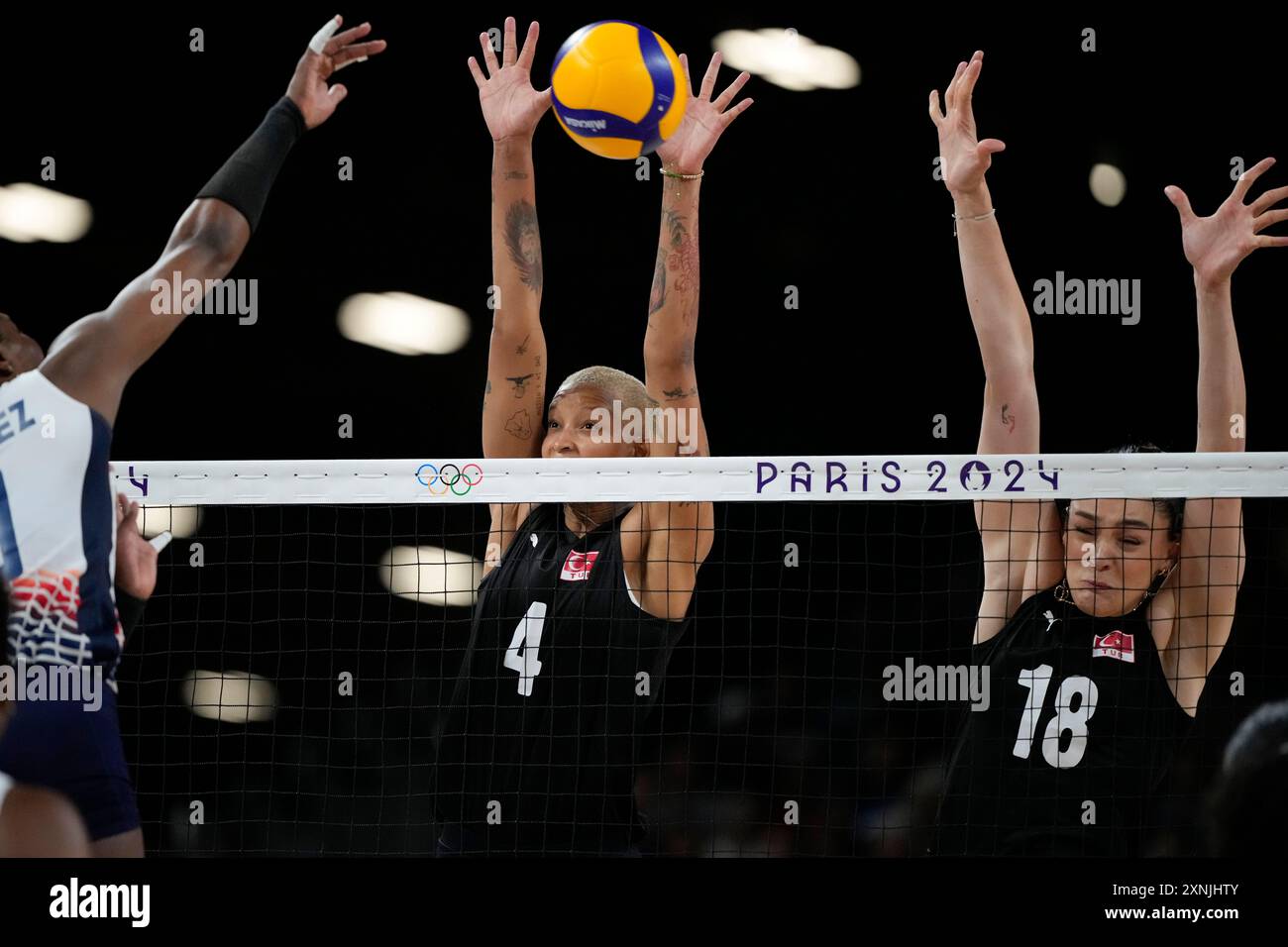 Turkey's Melissa Vargas, left, and Zehra Gunes block during the Group C ...