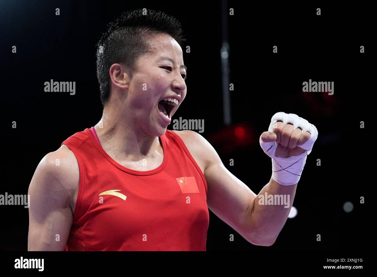 China's Wu Yu, celebrates after defeating India's Zareen Nikhat in ...
