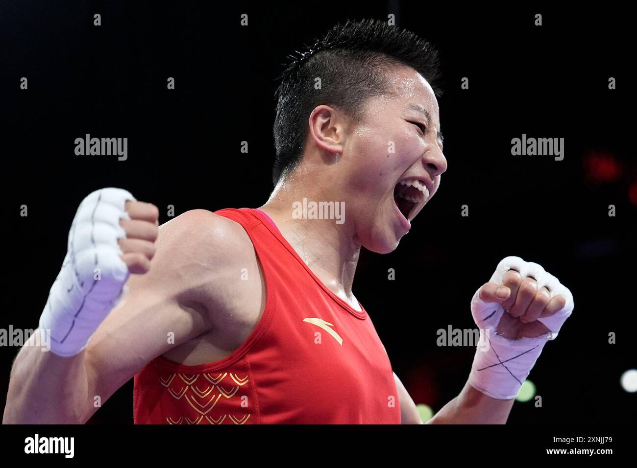 China's Wu Yu, celebrates after defeating India's Zareen Nikhat in ...