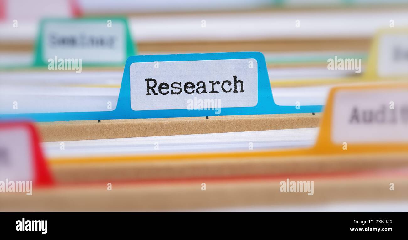 File folders with a tab labeled Research Stock Photo - Alamy